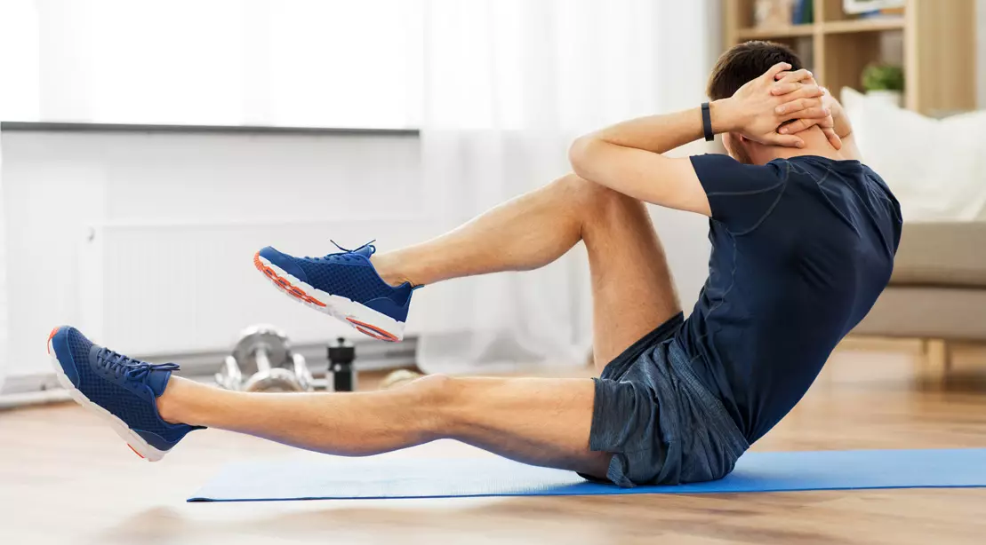 Man-Doing-Crunches-At-Home