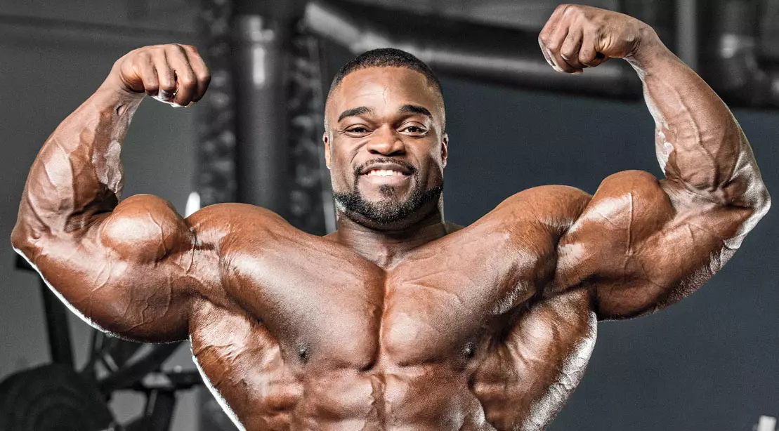 2019 Is-Sur Olympia Brandon Curry jippoża u juri l-biceps kbir tiegħu