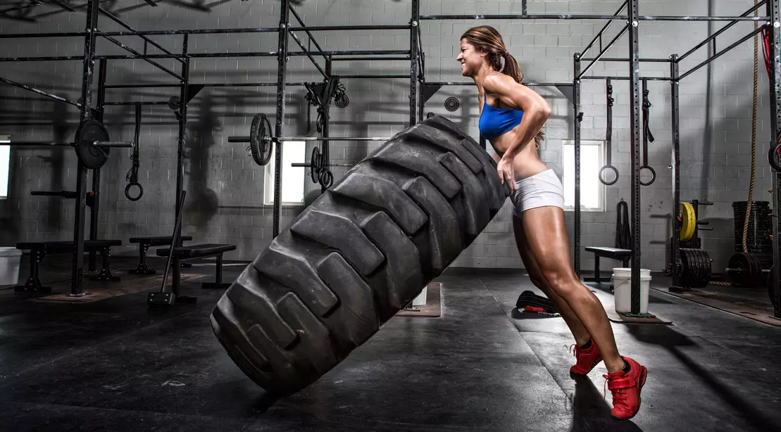 Woman Flipping Tire