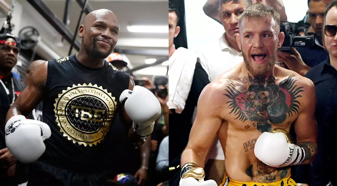 شاهد: Mayweather Jr. يدخل MMA Cage في صالة الألعاب الرياضية الخاصة به ، يستجيب McGregor