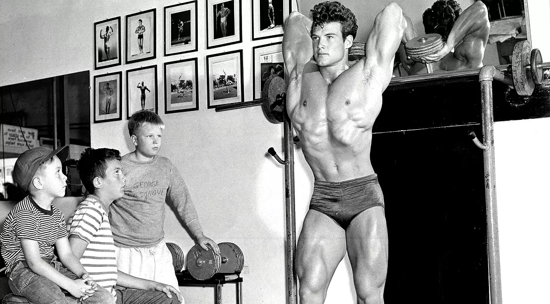 Steve-Reeves-Doing-Hantel-Overhead